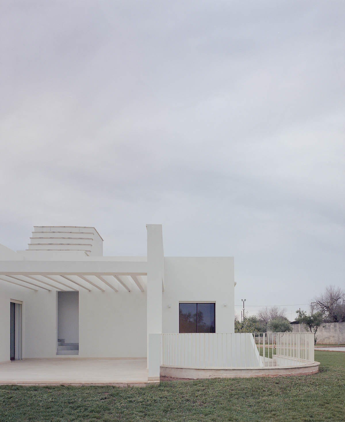 Rural retreat filters light through its stone porous screen in the ...