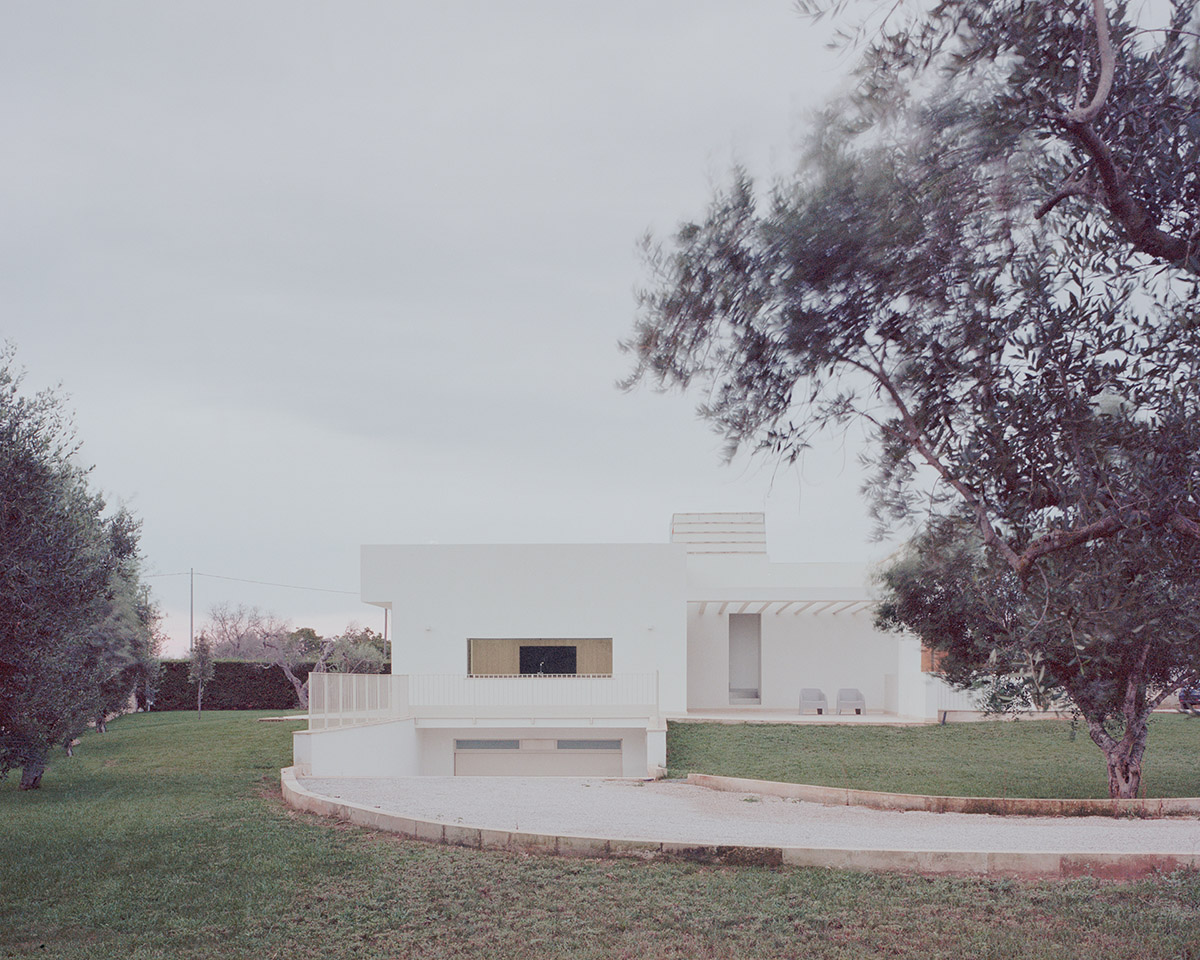 Rural retreat filters light through its stone porous screen in the ...