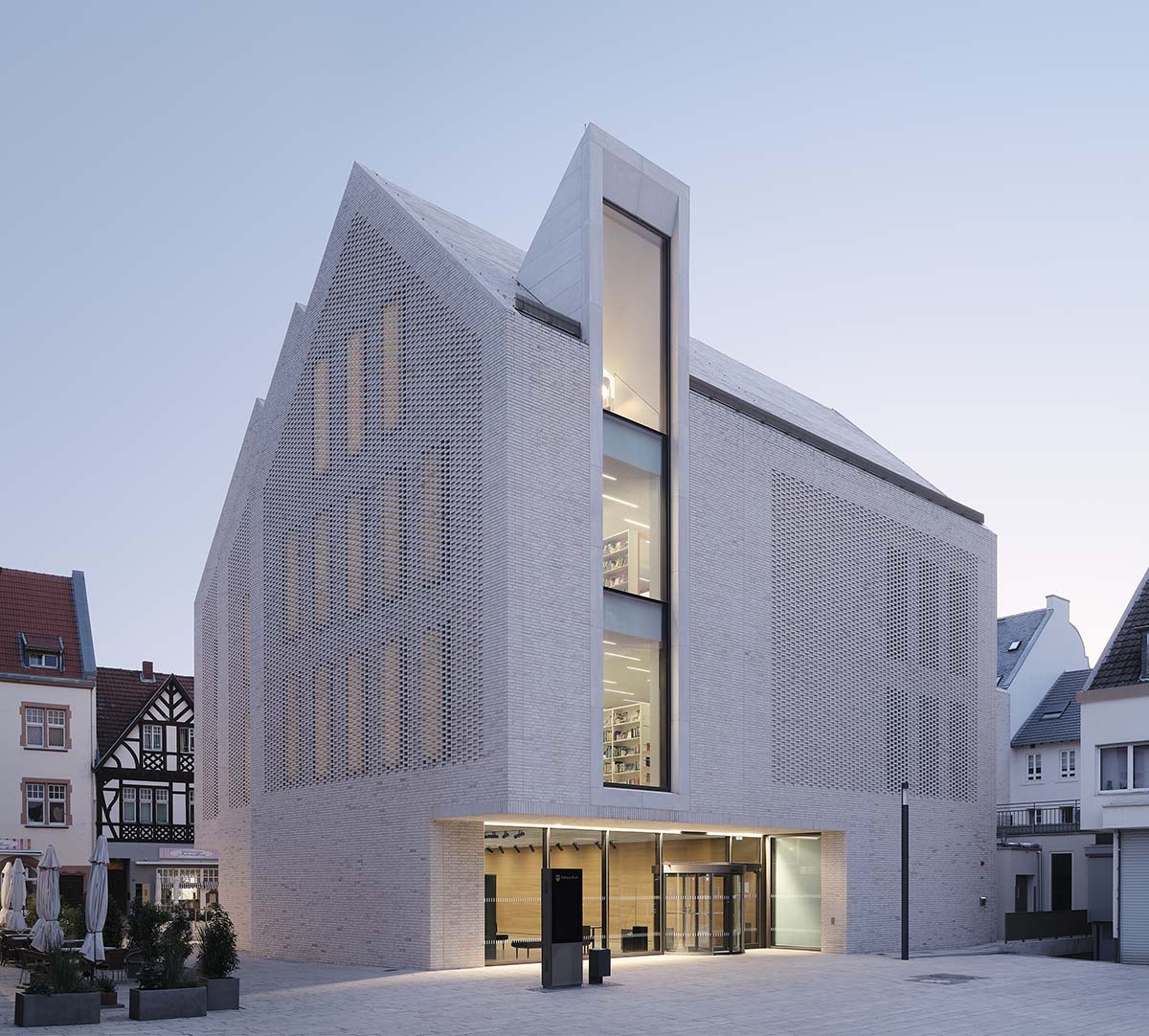 JSWD extends 1960s town hall with interlocking structures and ...