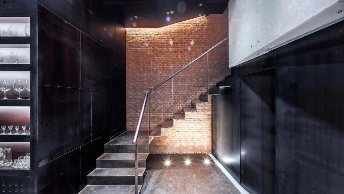 Atelier Alter converts old storage space into a stone archive using thousands of 10cm stone cubes