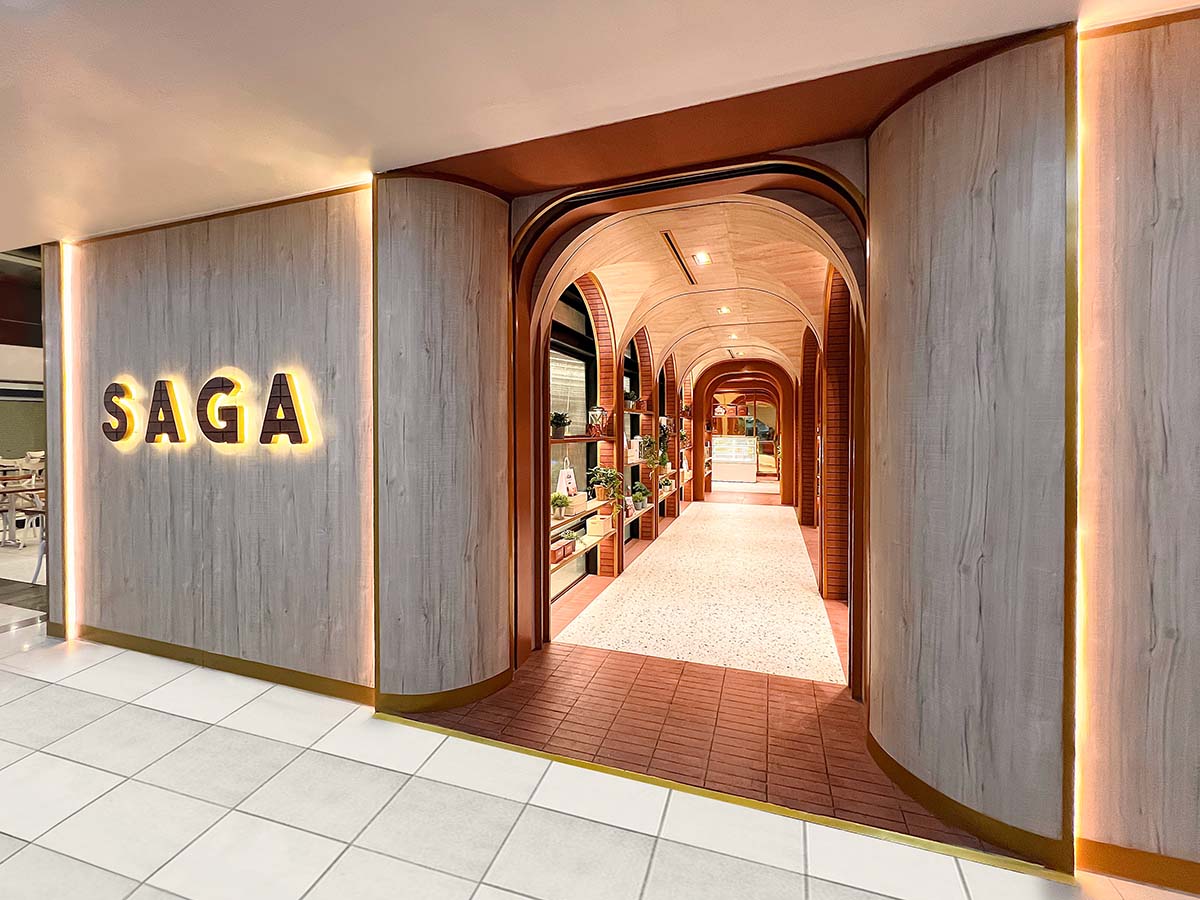 Bakery interior mimics arches and portals with bright red bricks in Papua, Indonesia