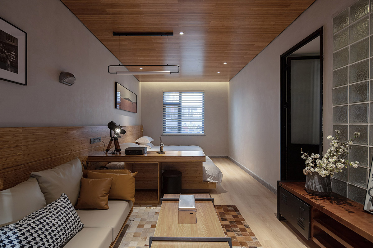 y.ad studio converts former hospital and old factory dormitories into homestay hotel in China