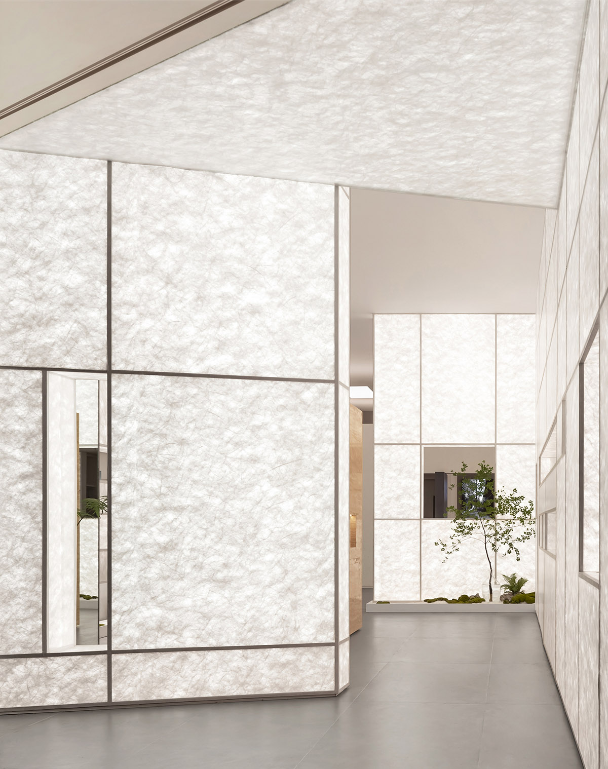 Luminous screen walls create fluid interiors for an optic store ...