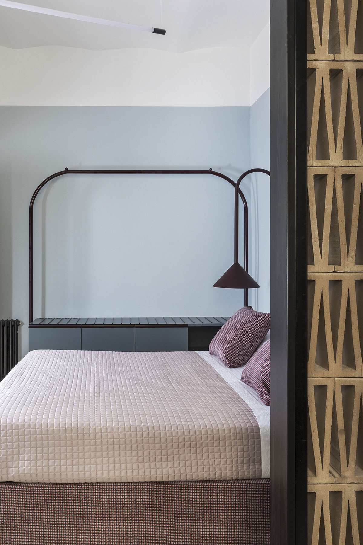 Totem House by STUDIOTAMAT is a rental home presenting cold shades and ...