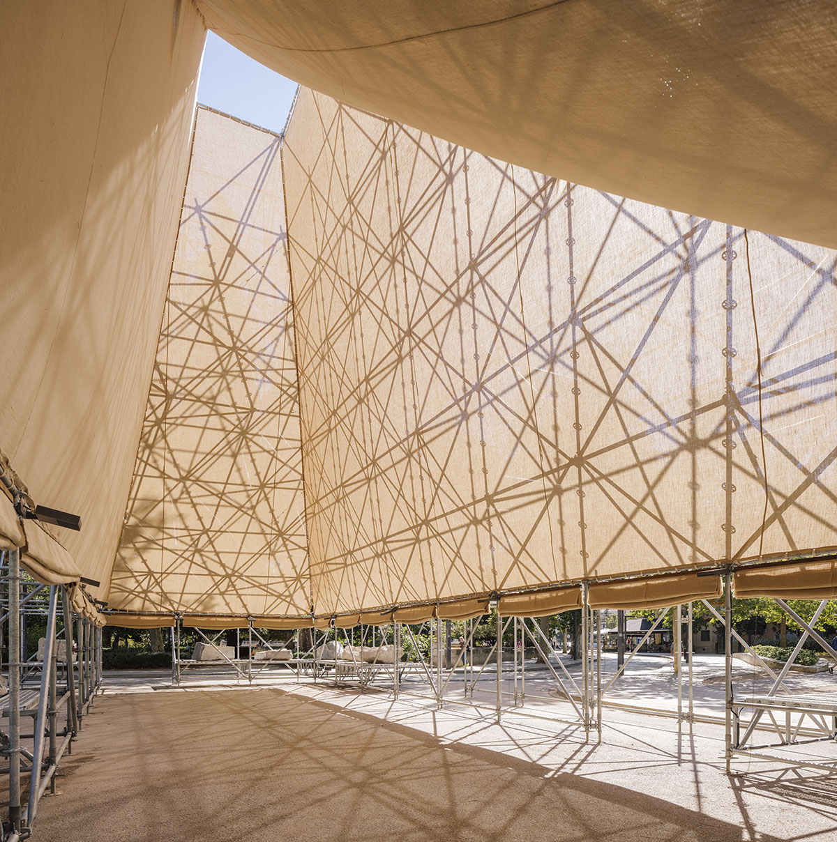 Aire Pavilion wrapped by giant scaffolding represents "unfinished ...