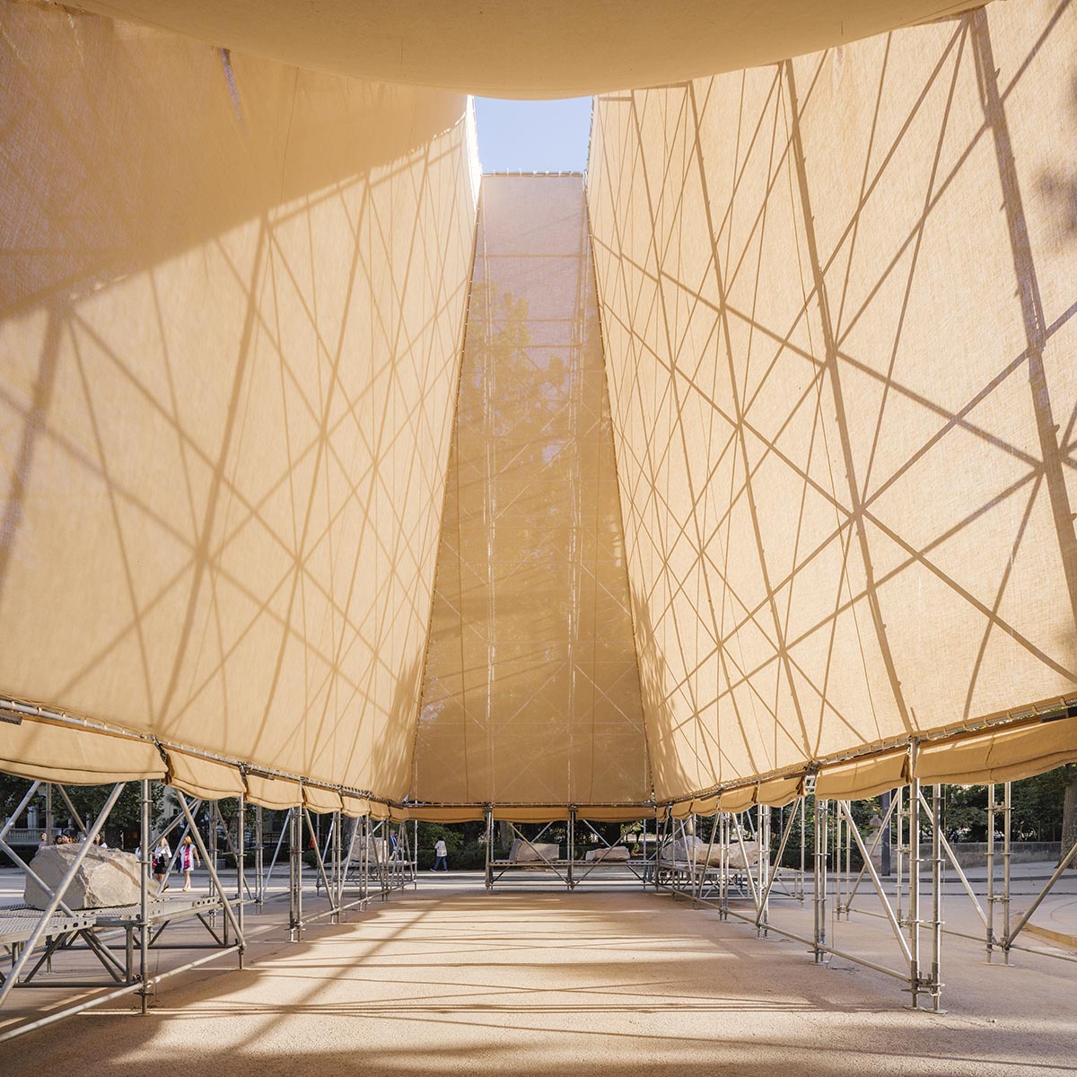 Aire Pavilion wrapped by giant scaffolding represents "unfinished ...