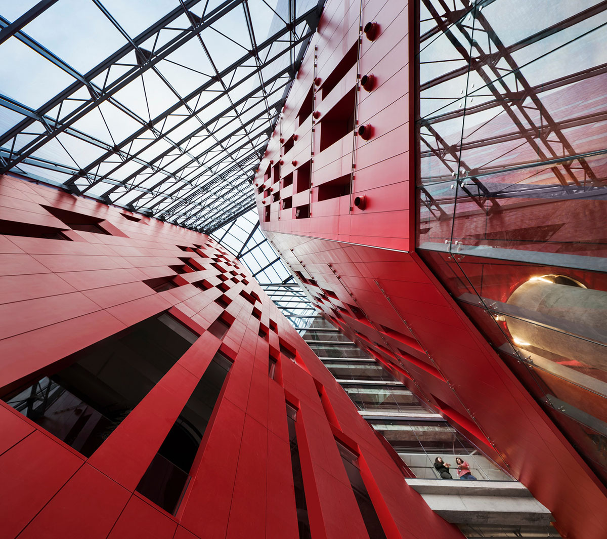 Provencher_Roy carves mixed-use office tower in Montréal with a red ...