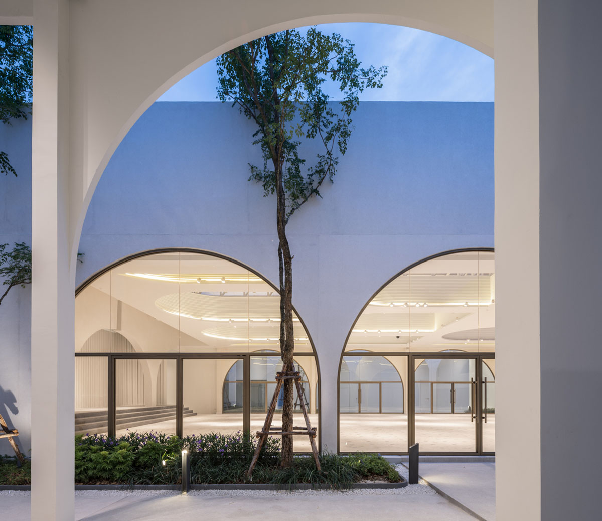 PHTAA creates flexible wedding venue with half-arch modular elements ...