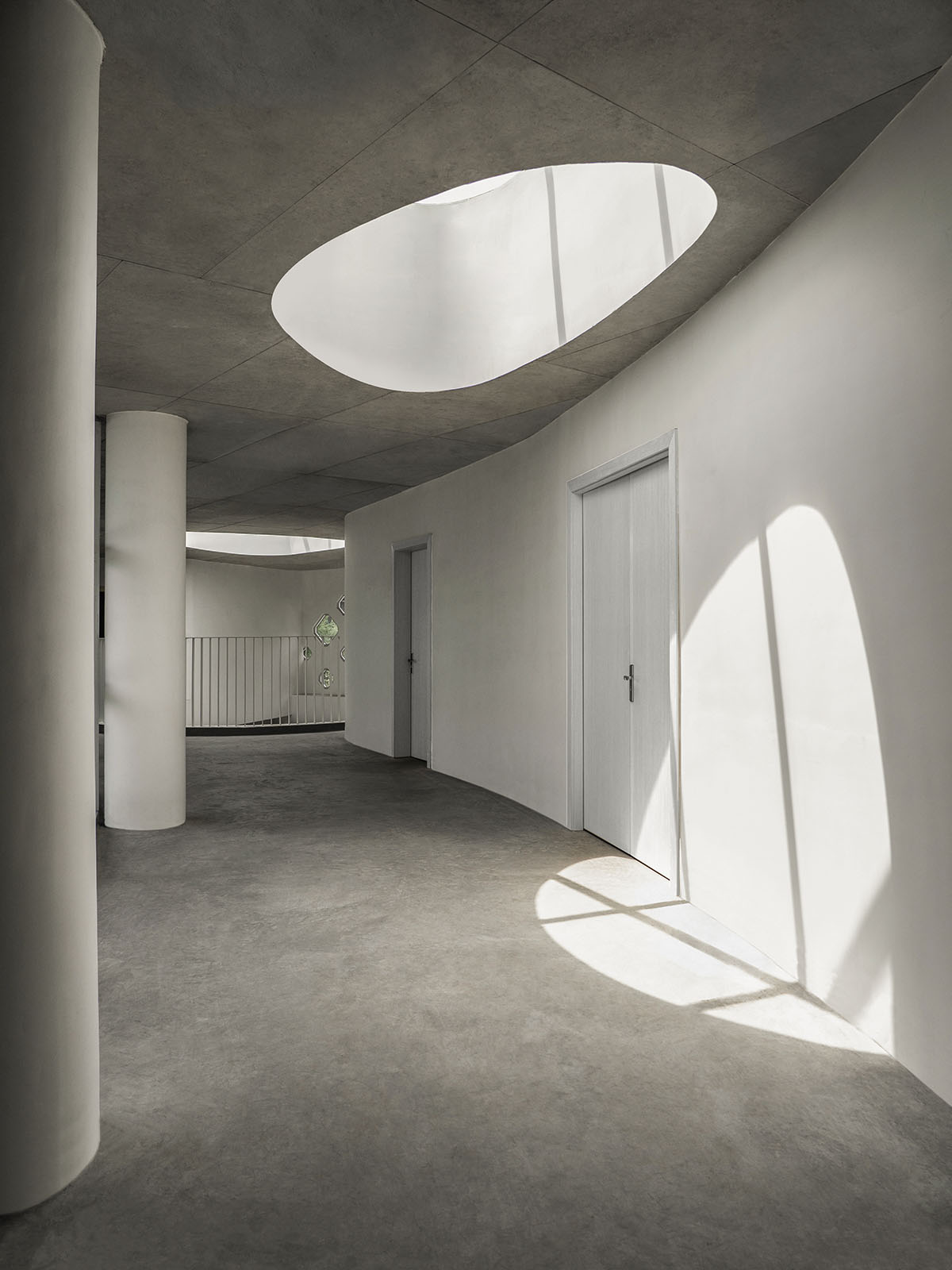 CROX reveals cultural center with drop-shaped windows with flowing ...