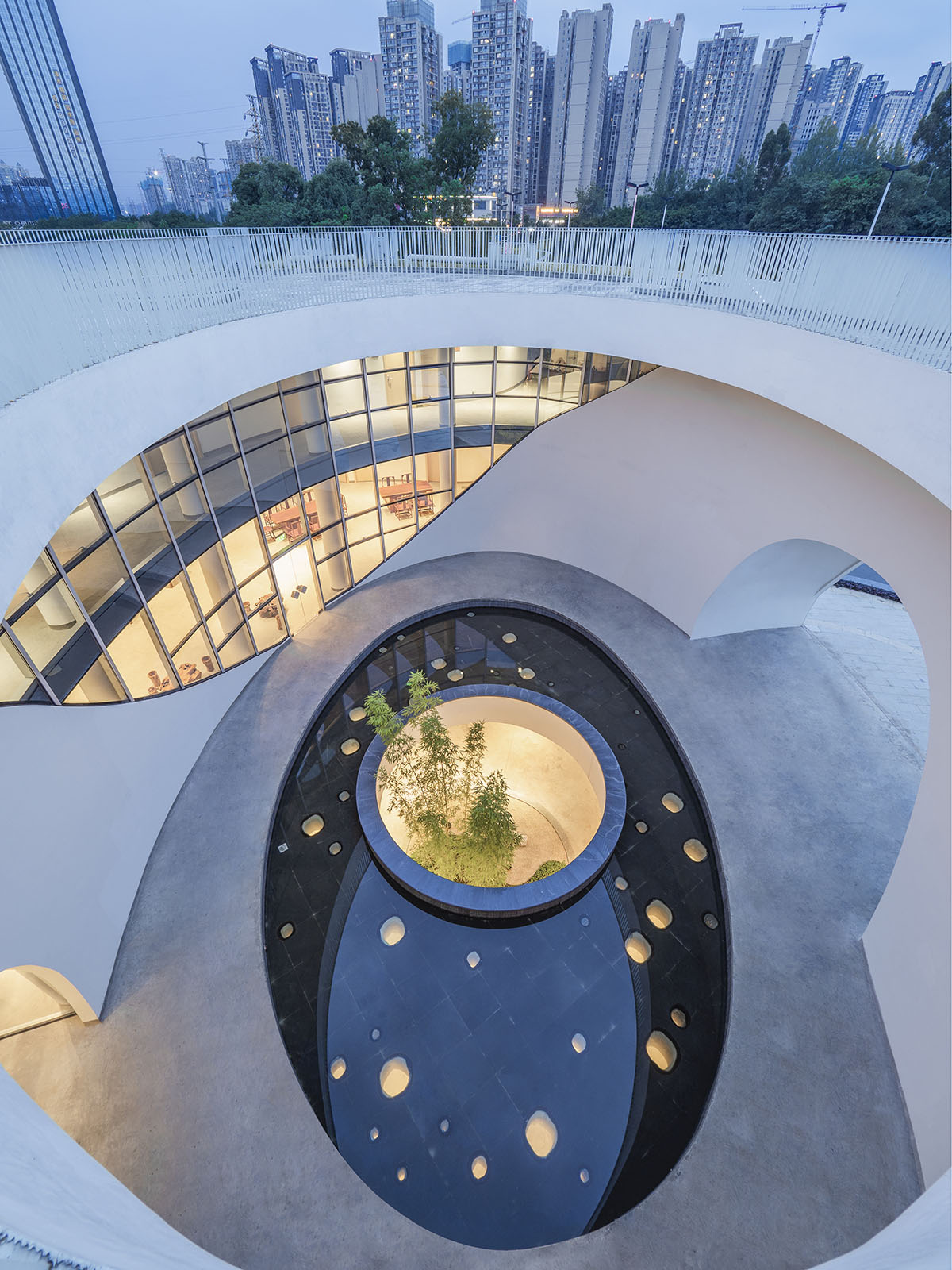 CROX reveals cultural center with drop-shaped windows with flowing ...
