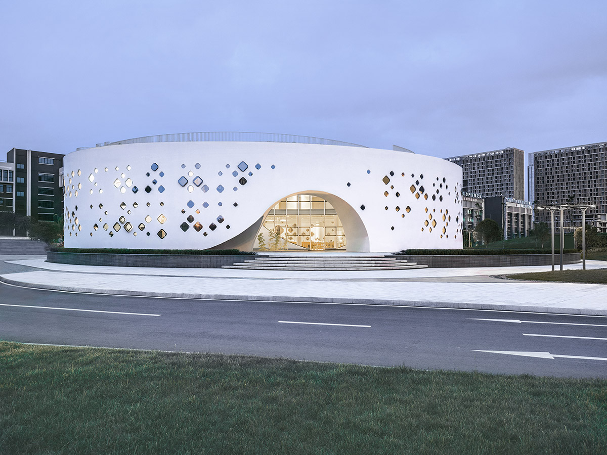 CROX reveals cultural center with drop-shaped windows with flowing ...