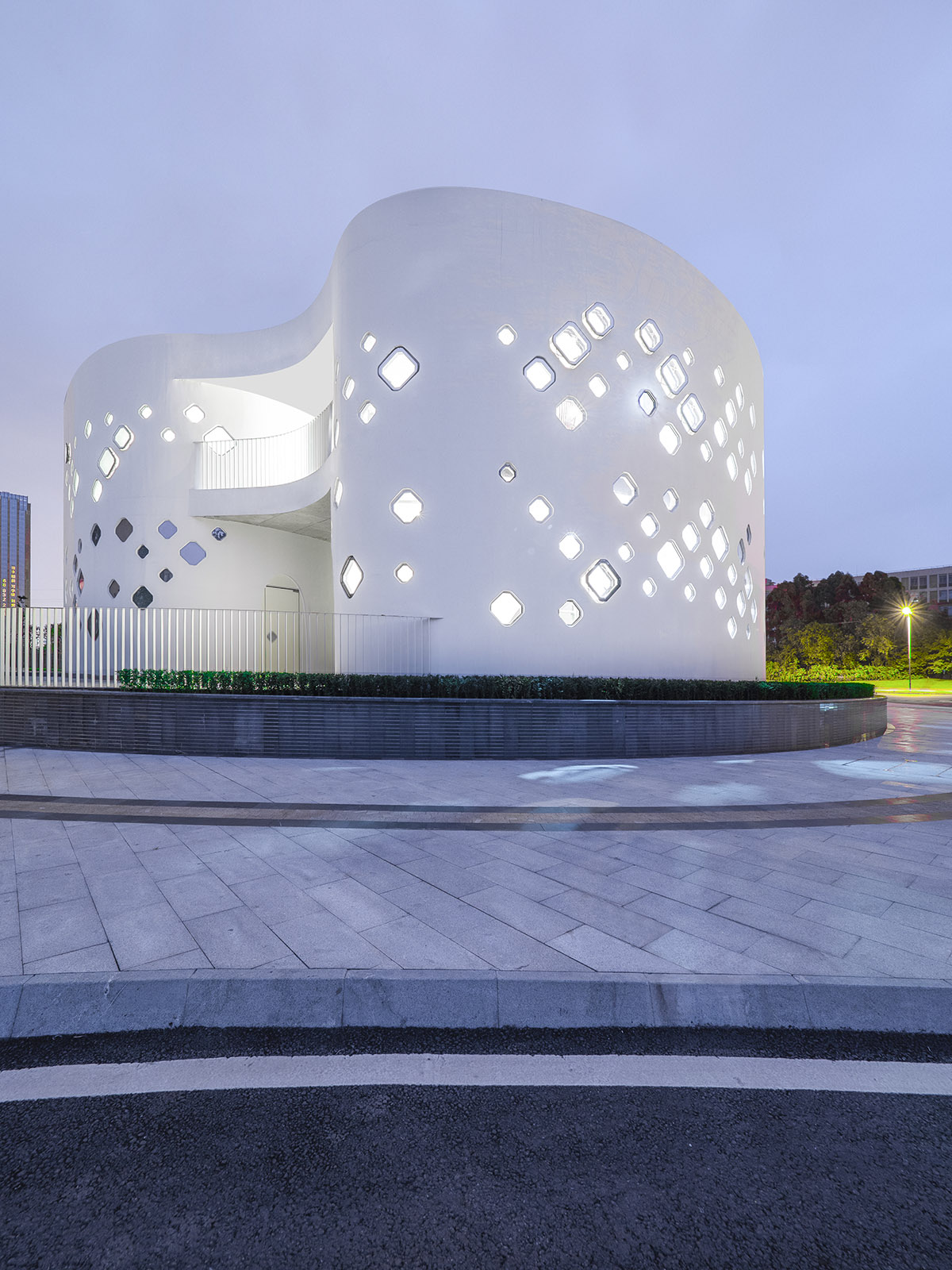 CROX reveals cultural center with drop-shaped windows with flowing ...