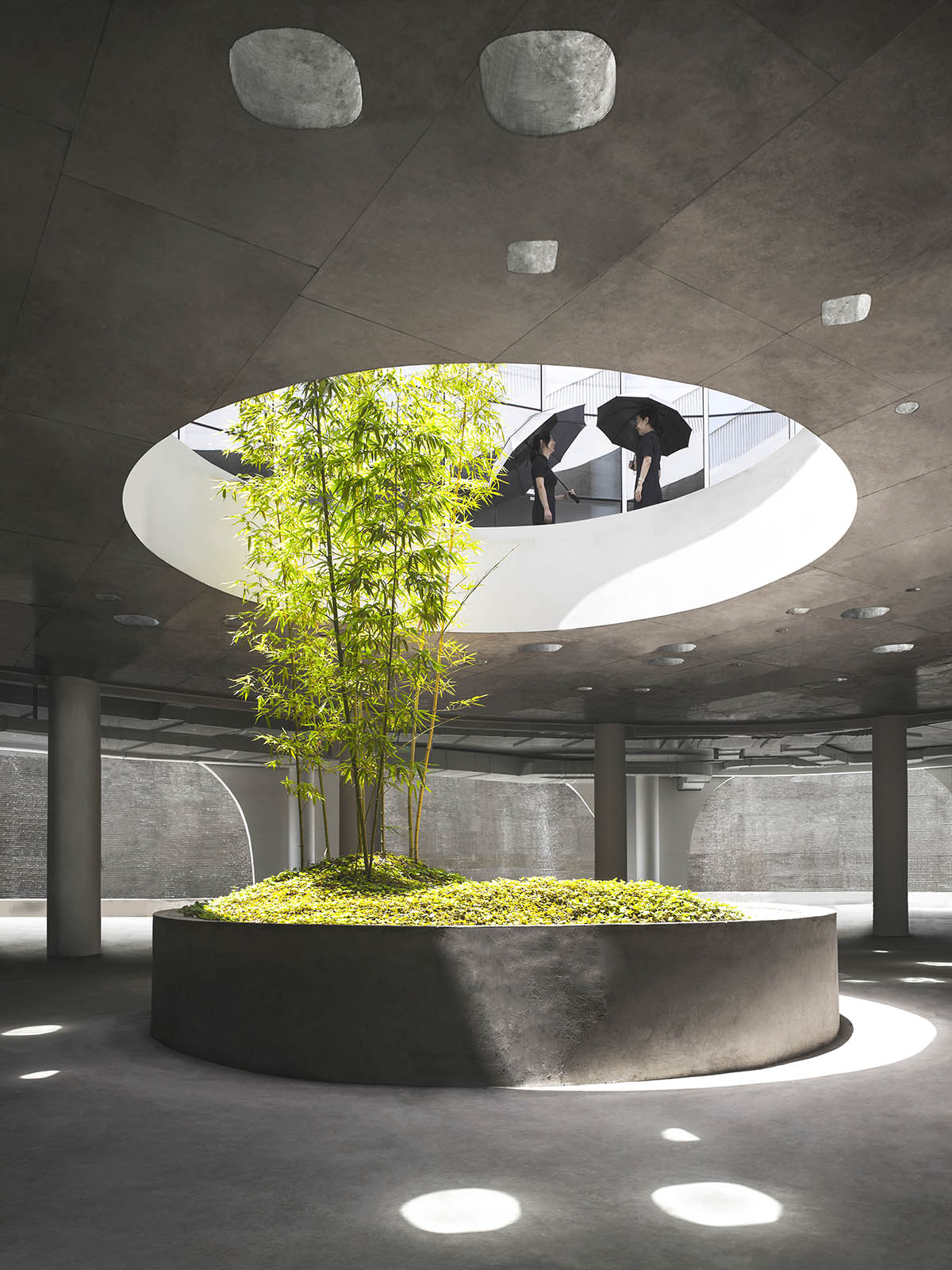 CROX reveals cultural center with drop-shaped windows with flowing ...