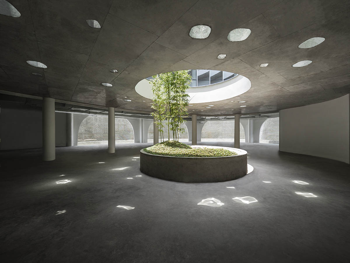 CROX reveals cultural center with drop-shaped windows with flowing ...