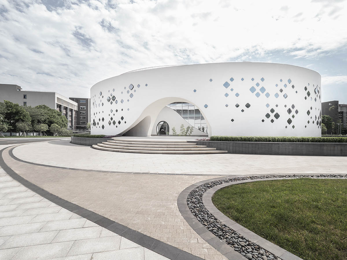 CROX reveals cultural center with drop-shaped windows with flowing ...