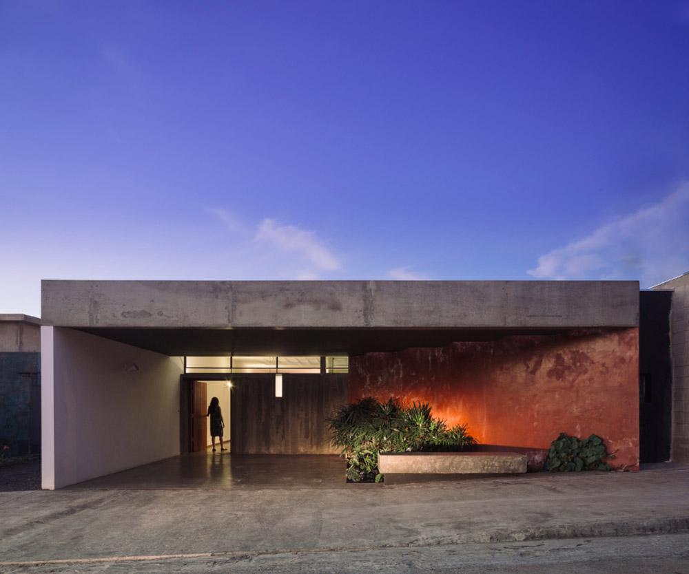 Vão designed recessed volumes and leaning red wall to offer flexible ...