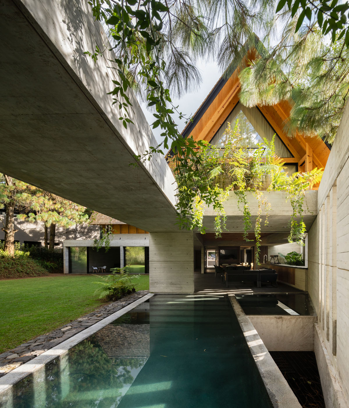Estudio MMX designs club house creating diagonal landscaped spaces in ...