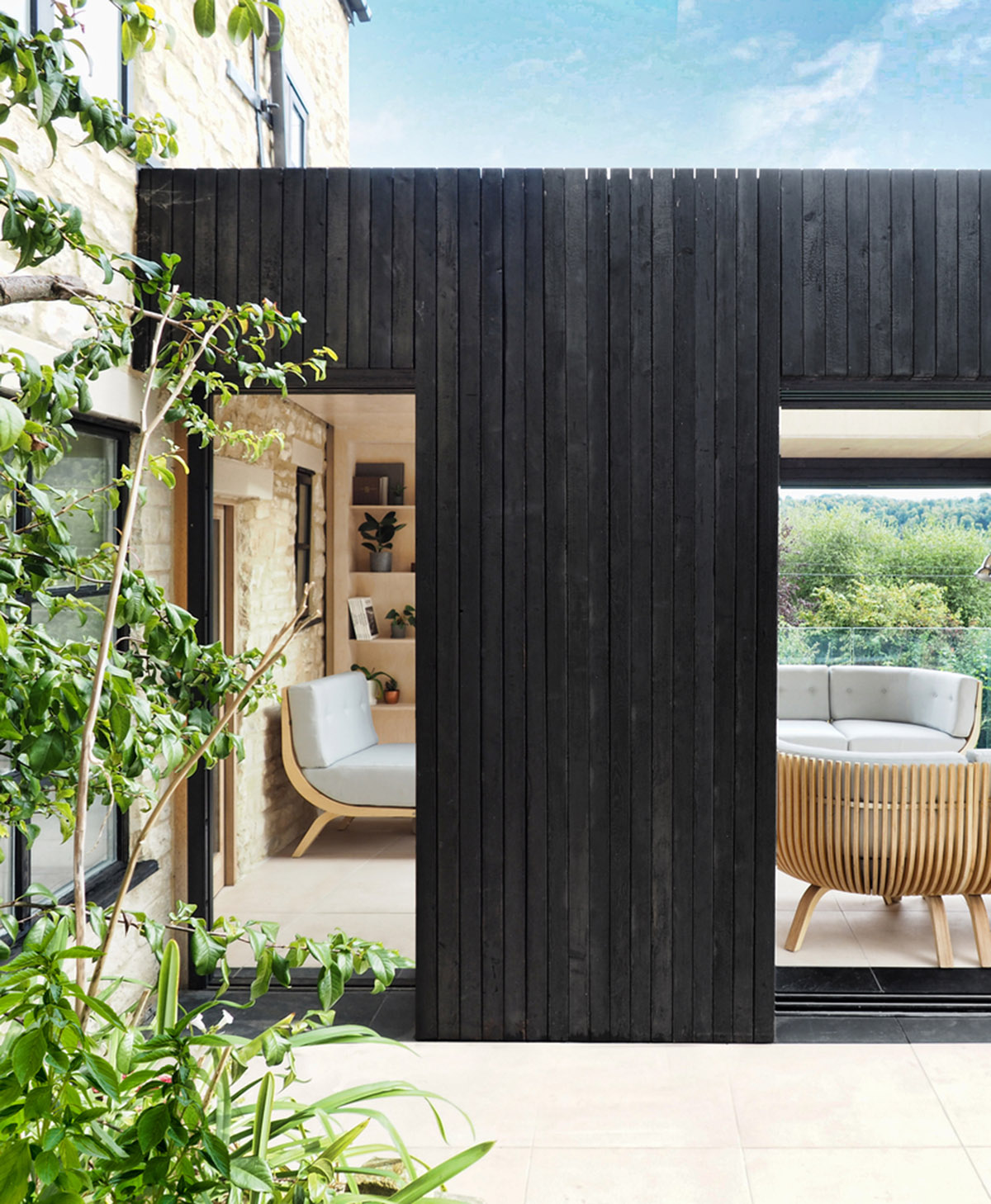George King Architects adds small charred timber extension to a 17th ...