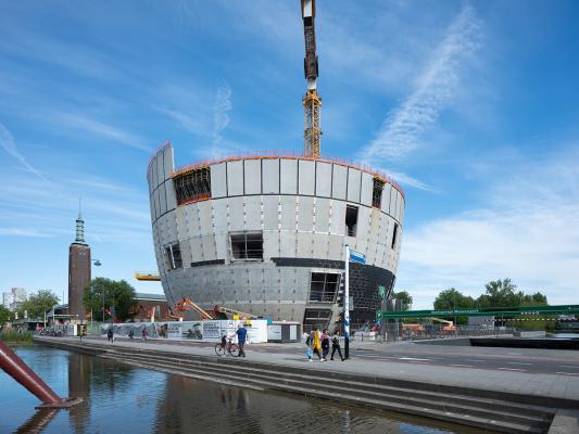 MVRDV's reflective bowl-shaped art depot tops out in Museumpark Rotterdam