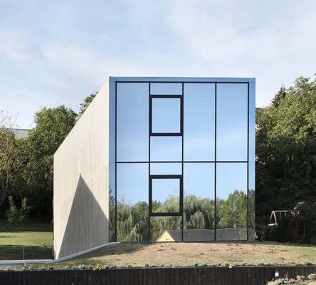 2001 designed a family house emerging fiercely from the ground like the ...