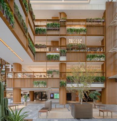 AIM Architecture redesigns shopping mall's atrium with suspended plants ...